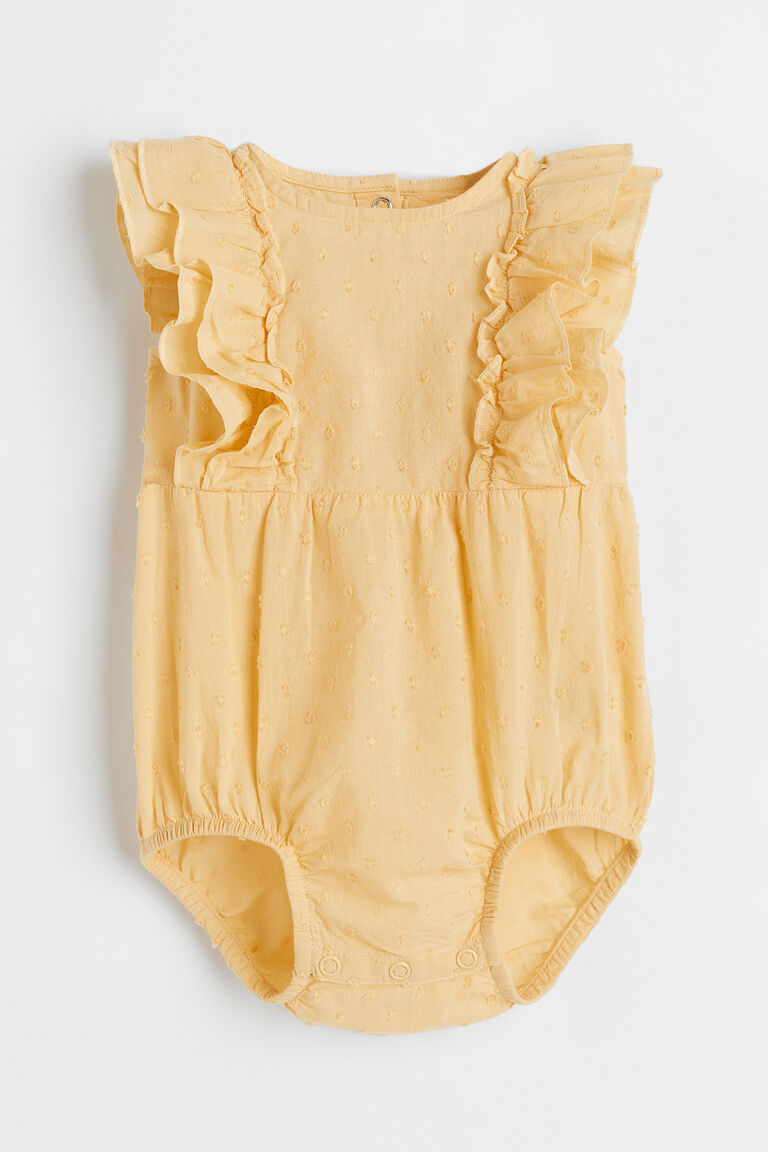 Flounce-trimmed romper suit